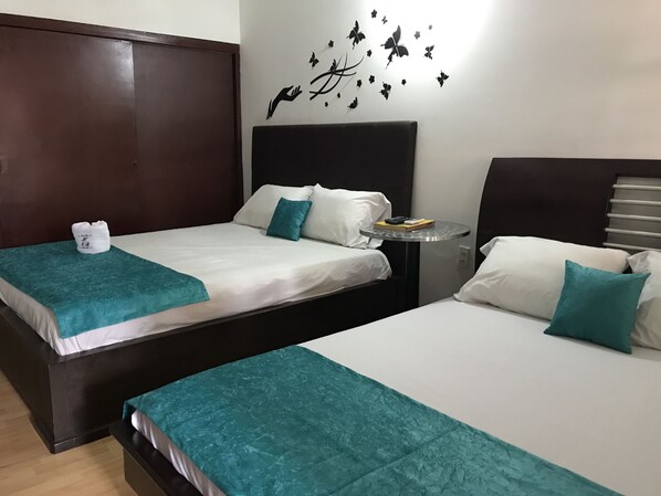 Quarto Duplo Básico, 1 quarto, casa de banho privativa (Air conditioner) | Quartos insonorizados, ferro/tábua de engomar, Wi-fi grátis 