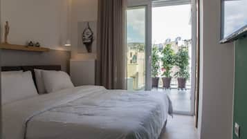 Penthouse de Luxo, 4 quartos, banheira de hidromassagem grande, Vista para a cidade | 4 quartos, roupa de alta qualidade, cofre no quarto