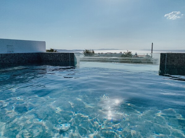 Suíte júnior, piscina particular, vista para o mar | Vista do quarto