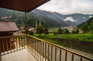 Quarto triplo luxo, banheira de hidromassagem | Sacada