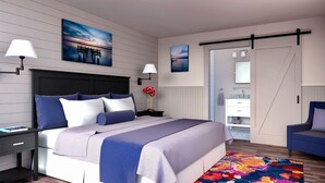 Um quarto moderno com uma cama grande, mesas de cabeceira, um criado-mudo, uma cadeira, um tapete colorido e obras de arte nas paredes.