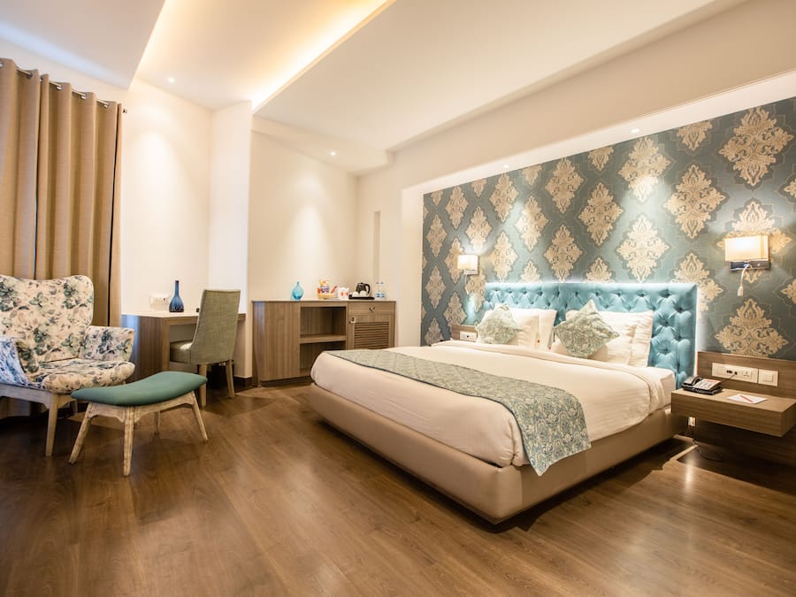 Quarto Executivo, 1 cama king-size | Minibar, cofre no quarto, secretária, camas desdobráveis