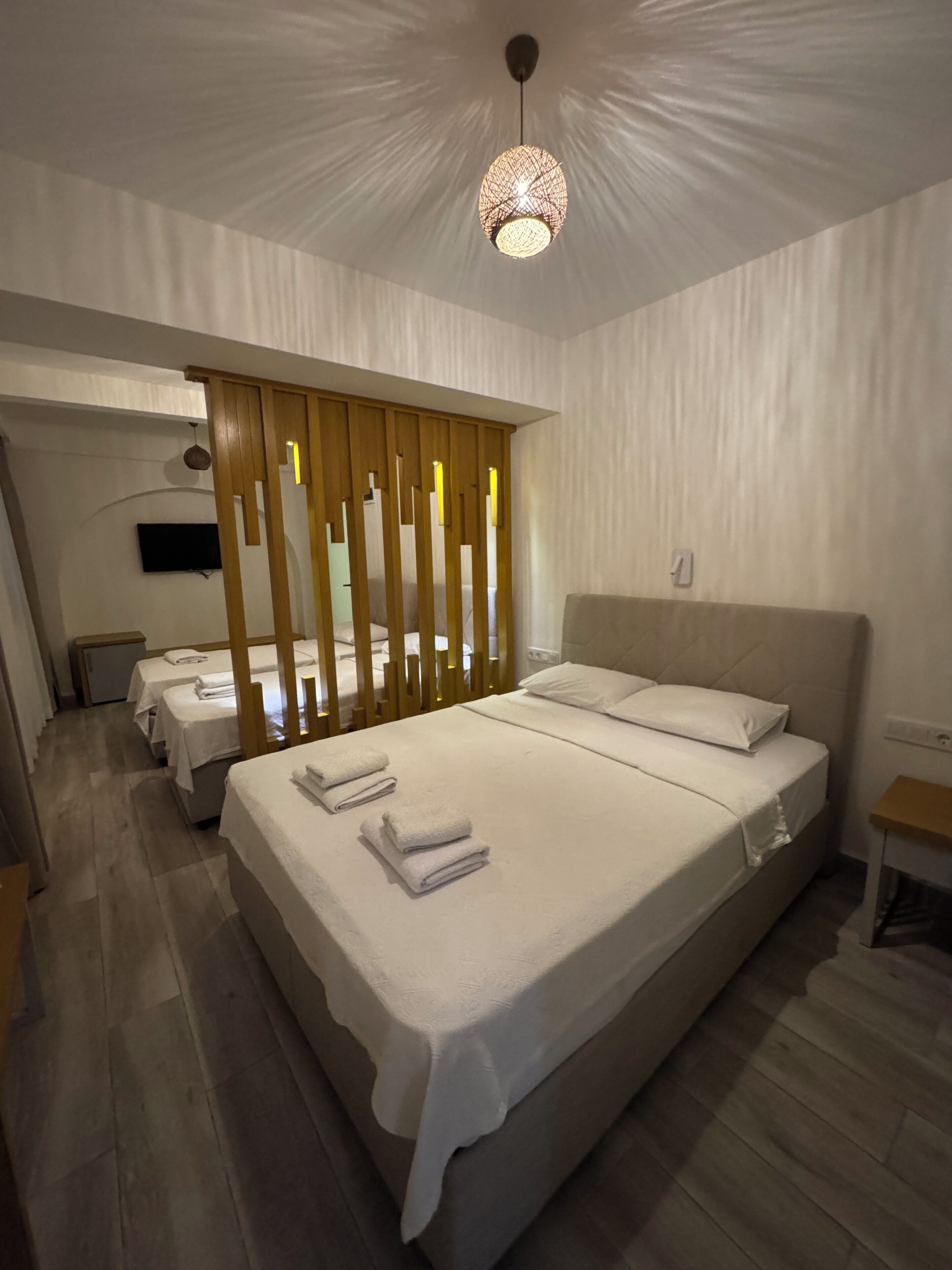 Quarto Quádruplo Comfort, no canto | Roupa de alta qualidade, camas de colchão Select Comfort 