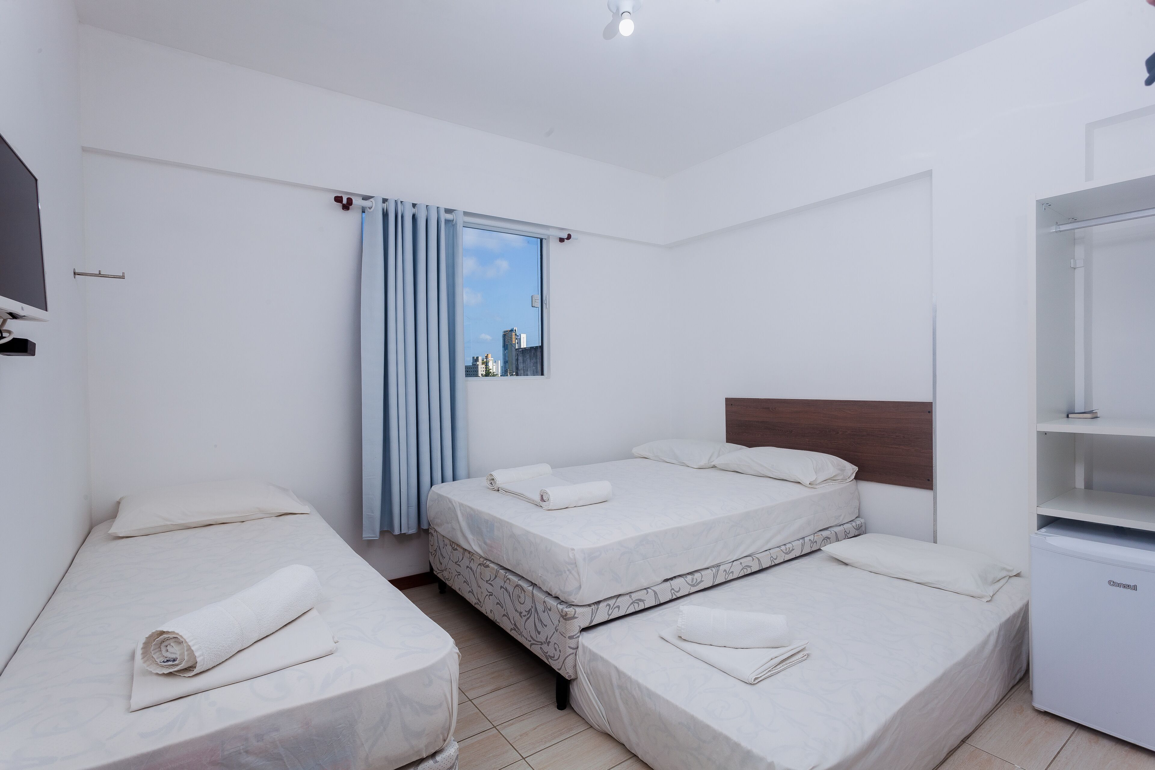 Frigobar, cortinas blackout, Wi-Fi de cortesia, roupa de cama