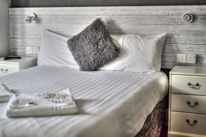Wi-Fi de cortesia, roupa de cama