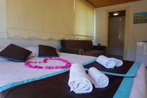 Quarto quádruplo família | Wi-Fi de cortesia, roupa de cama