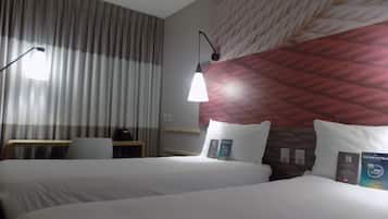 Apartamento Standard, 2 camas individuais | Roupa de alta qualidade, secretária, quartos insonorizados