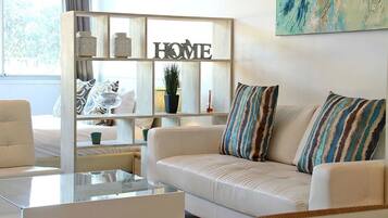 Estúdio | Área de estar | TV de tela plana