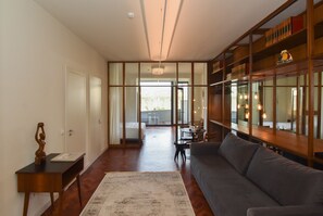 Quarto Duplo Deluxe, varanda | Sala de estar