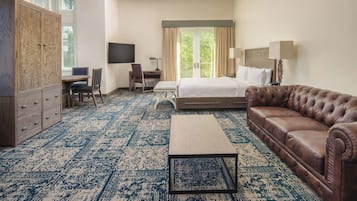 Suite, 1 cama king-size, não fumadores | Secretária, cortinas/cortinados opacos, ferro/tábua de engomar
