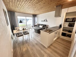 Apartamento | Área de estar | TV de tela plana
