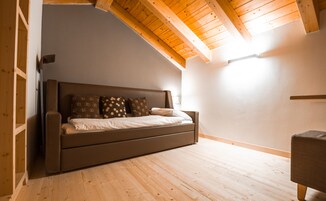 Quarto quádruplo superior | Camas extras