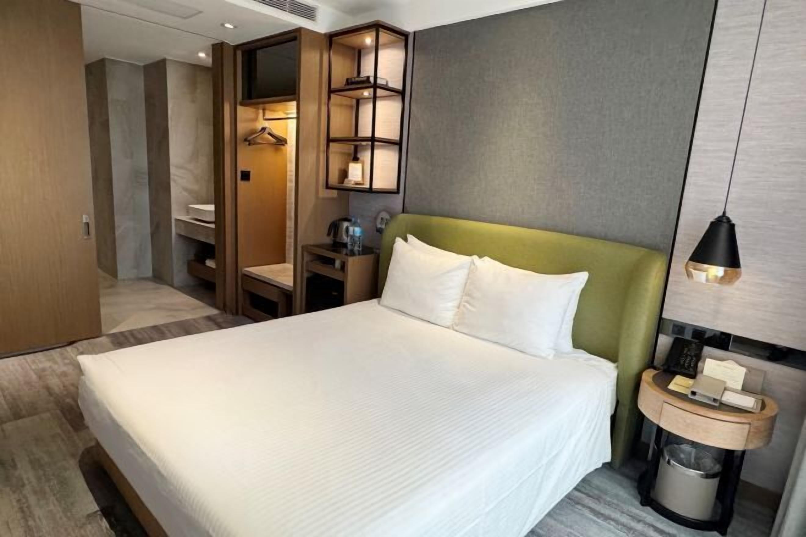 Roupas de cama premium, cofres nos quartos, individualmente mobiliados