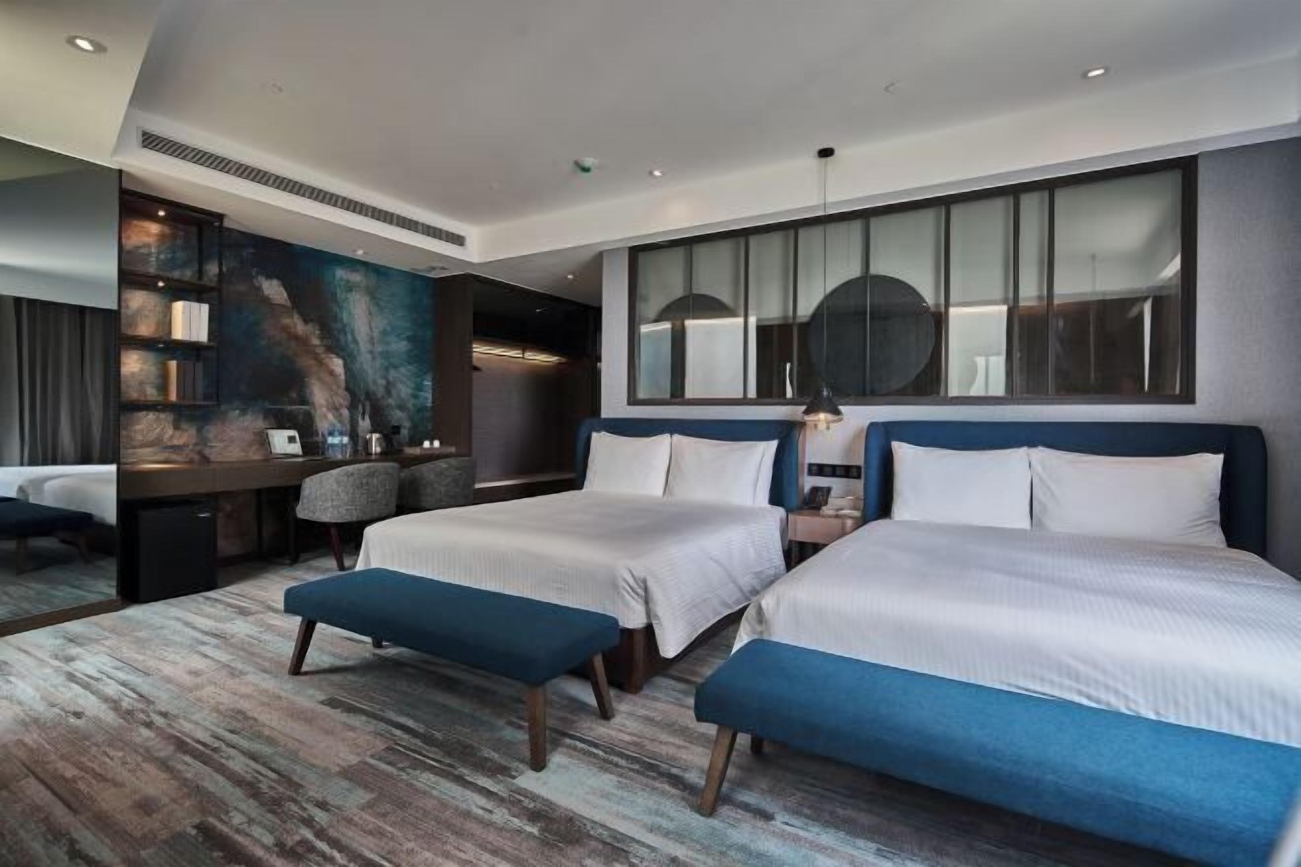 Roupas de cama premium, cofres nos quartos, individualmente mobiliados