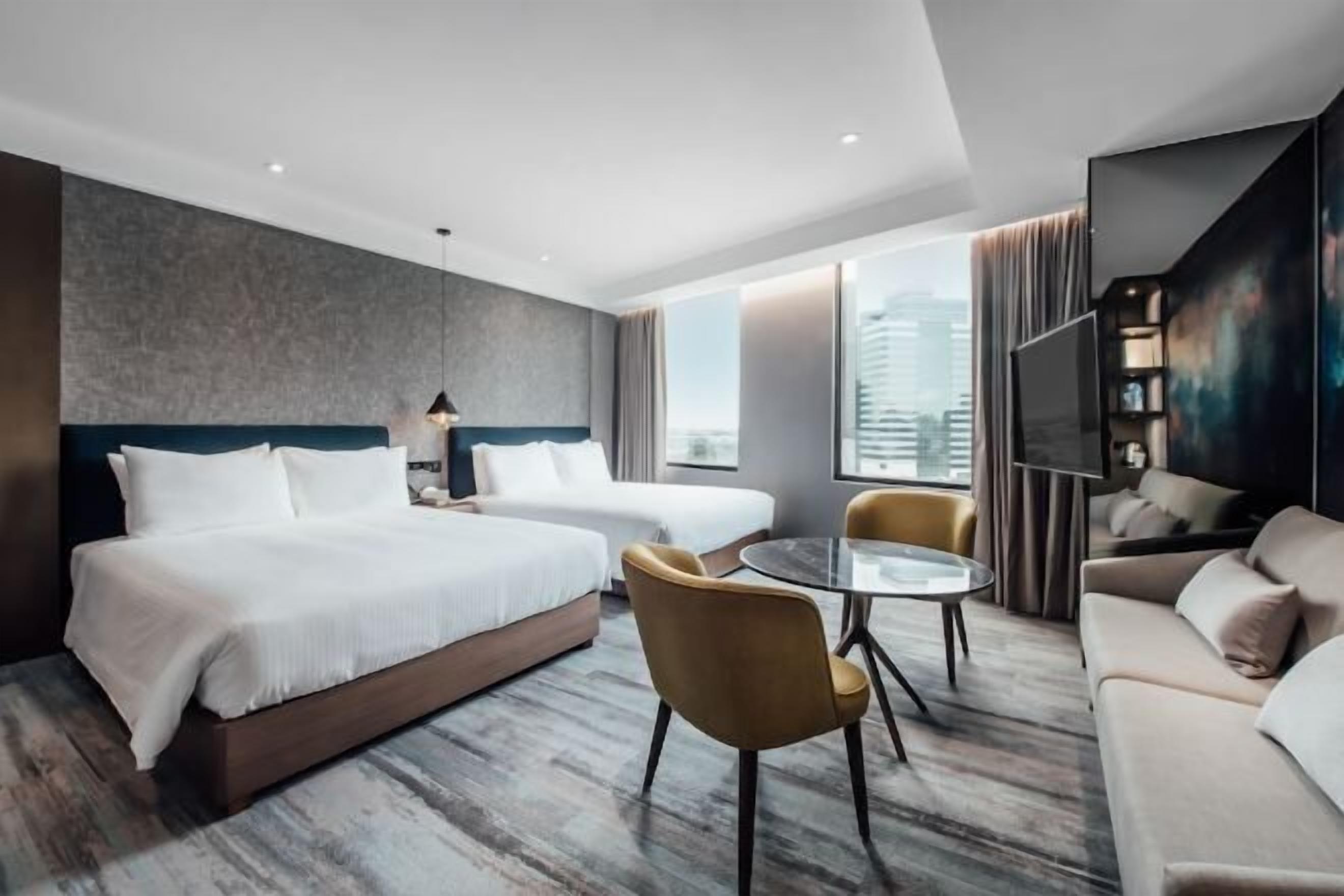 Roupas de cama premium, cofres nos quartos, individualmente mobiliados