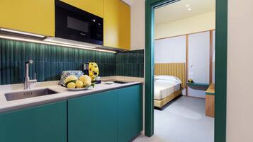 Apartamento, 1 quarto, fumadores, 2 casas de banho | Cozinha privada | Um frigorífico, um forno