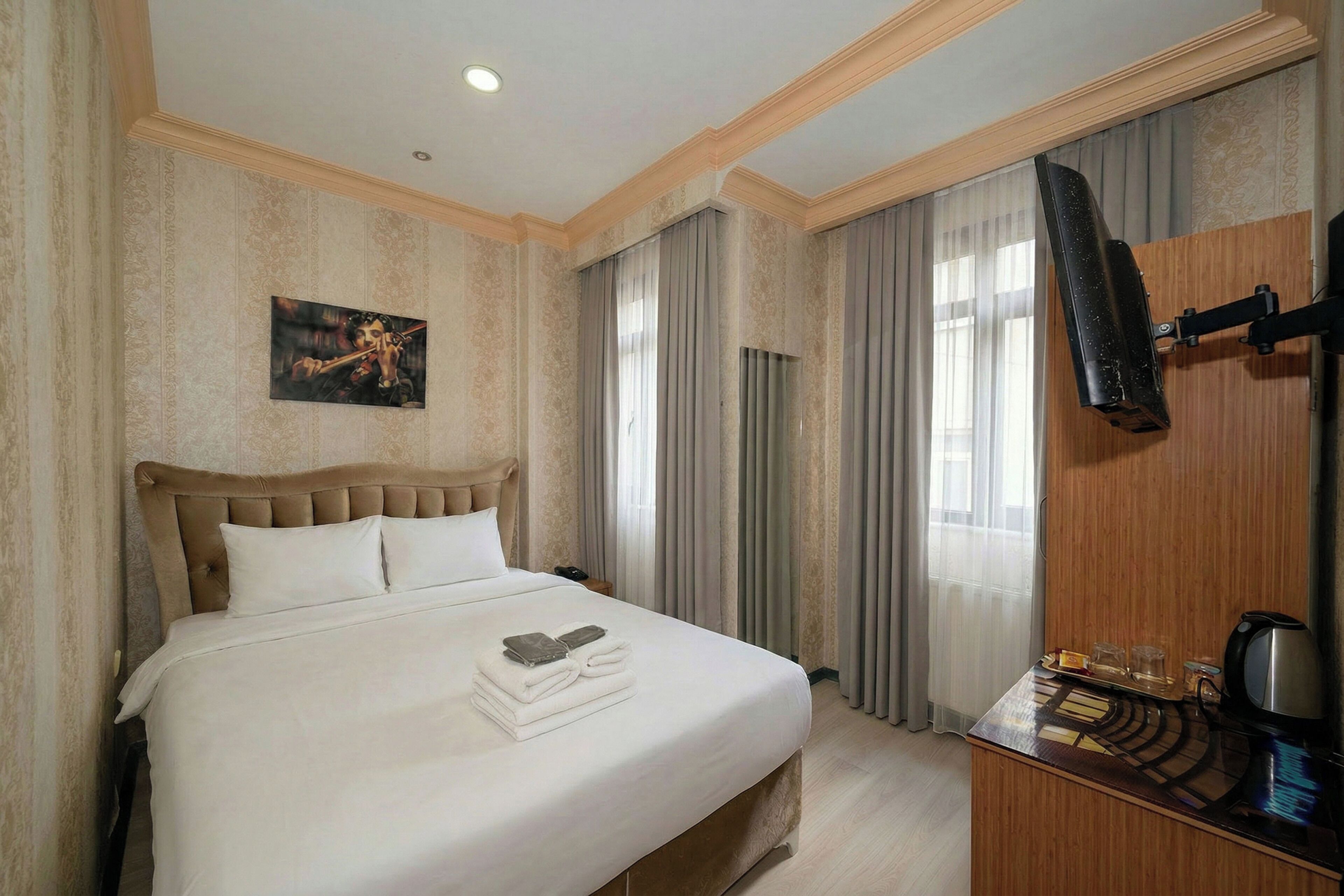 Minibar, cofre no quarto, cortinas/cortinados opacos 
