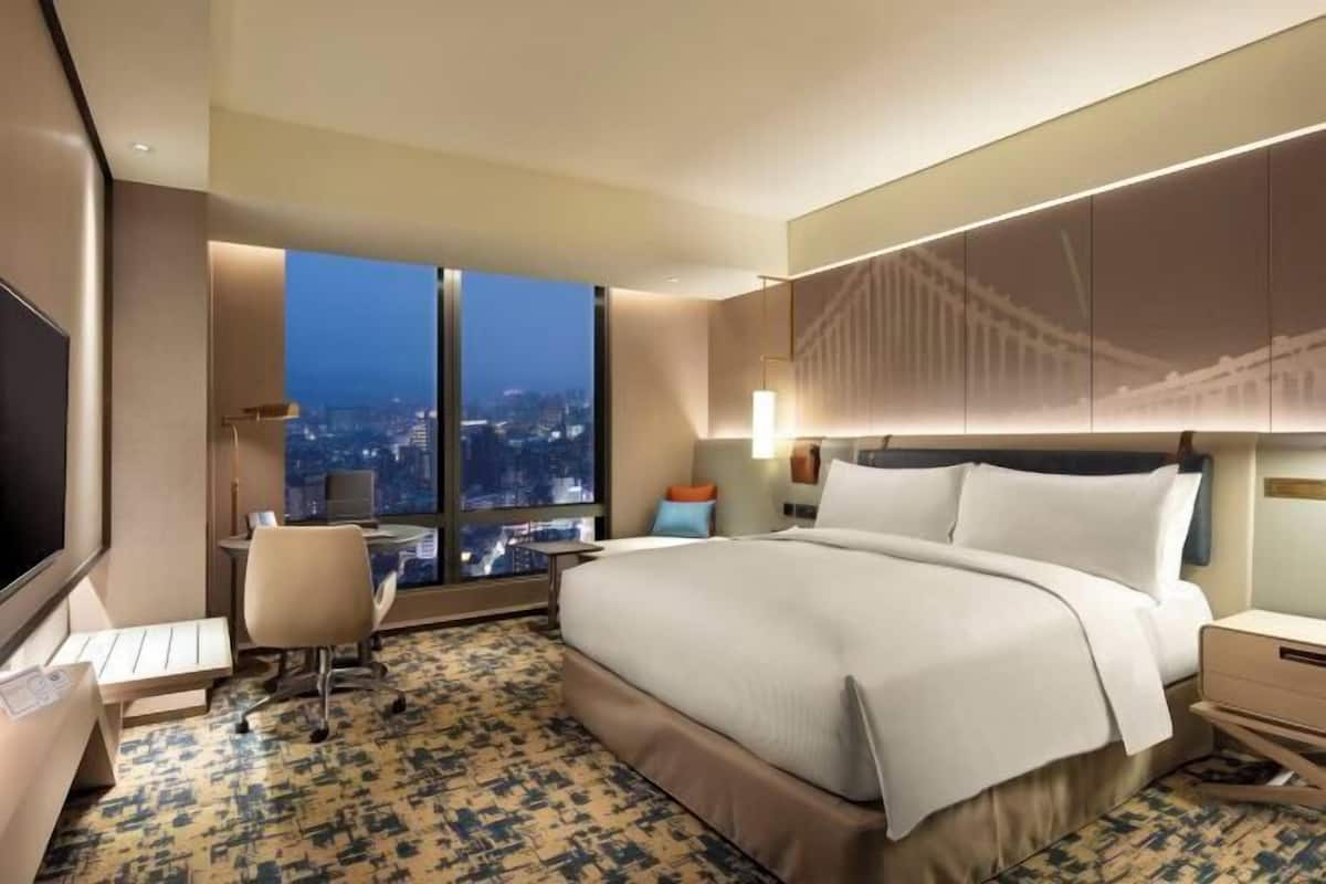 Roupa de alta qualidade, camas de colchão viscoelástico, minibar 