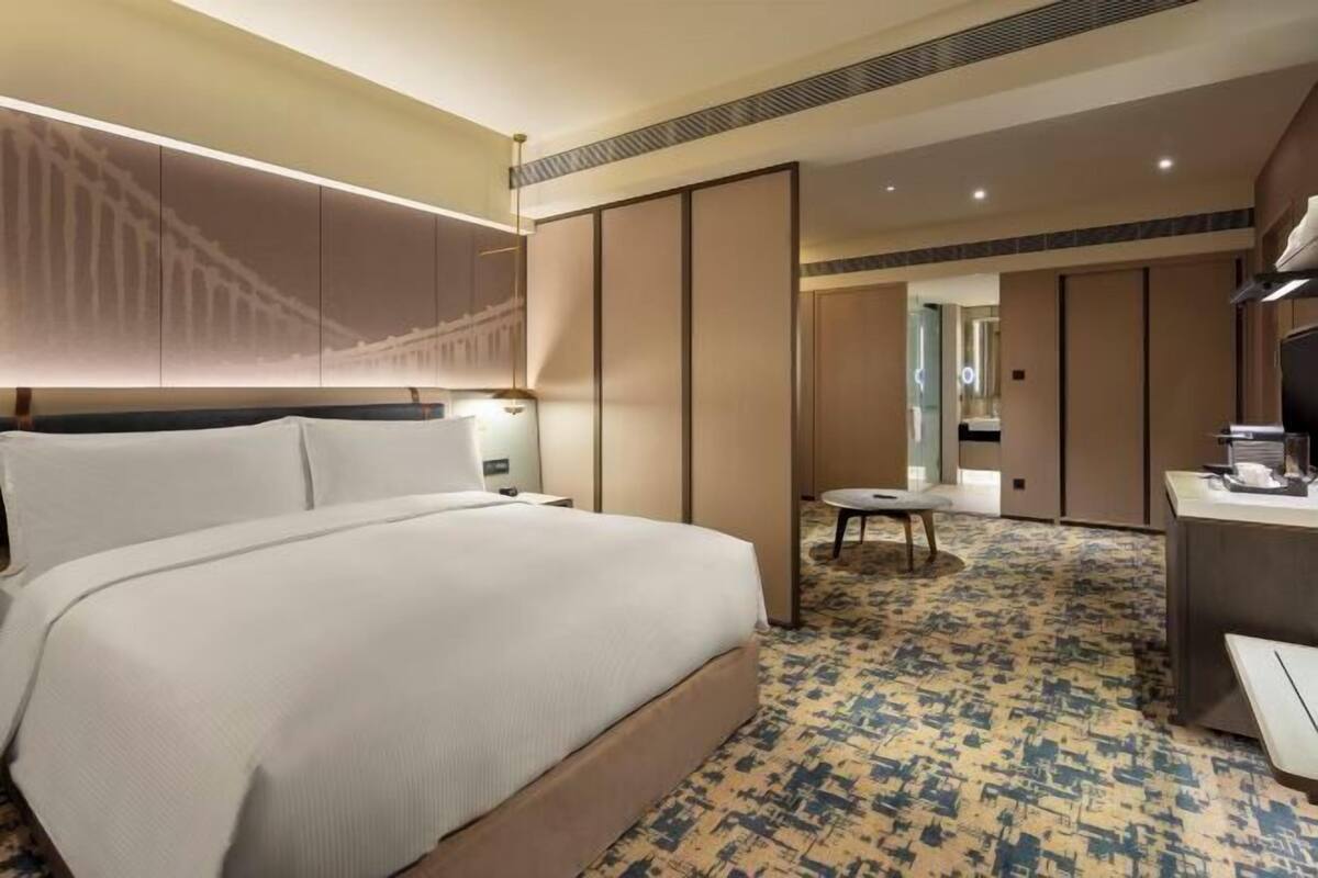 Roupa de alta qualidade, camas de colchão viscoelástico, minibar 