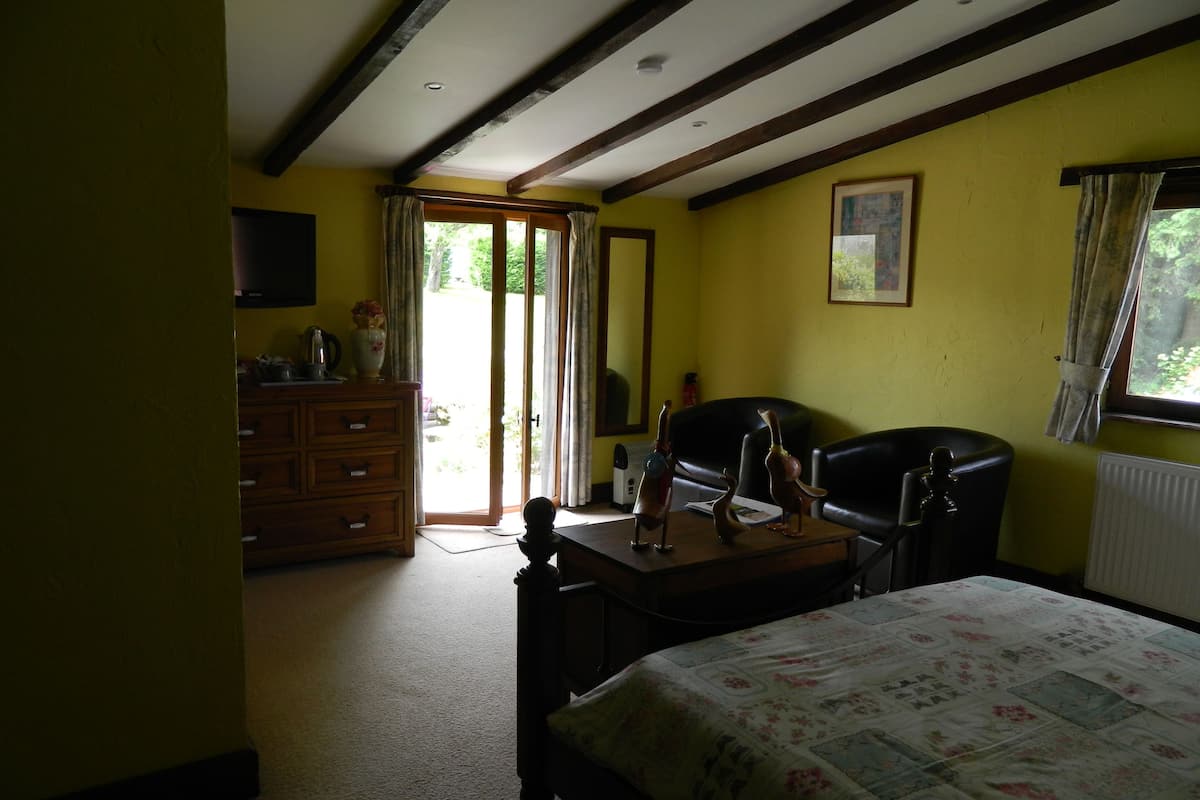 Quarto Duplo Superior, vista para o jardim, no rés do chão | 1 quarto, Wi-fi grátis, roupa de cama fornecida