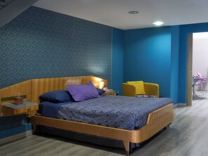 Suíte luxo, 2 quartos (Home Naples) | 1 quarto, roupas de cama de algodão egípcio, roupas de cama premium