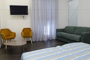 Quarto quádruplo conforto | Roupas de cama premium