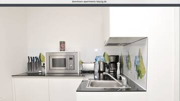 Apartamento (Three) | Minibar, quartos insonorizados, camas desdobráveis, Wi-fi grátis