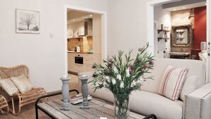 Apartamento superluxo, 1 quarto | Sala de estar