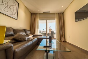 Suite Comfort | Sala de estar | Smart TV 