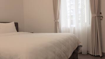 Apartamento, 1 quarto, varanda | Sala de estar | Smart TV de 50 polegadas com canais por cabo, televisor