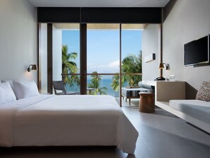 Quarto Duplo Deluxe, vista para o oceano | Cofre no quarto, secretária, cortinas/cortinados opacos