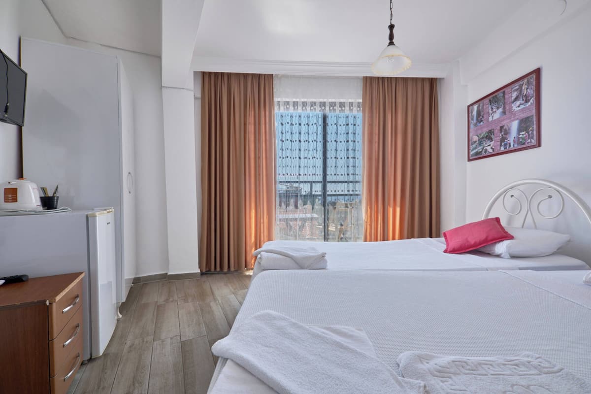 Minibar, Wi-fi grátis, roupa de cama fornecida