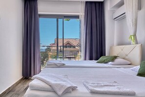 Frigobar, Wi-Fi de cortesia, roupa de cama