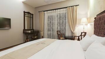 Suíte | 1 quarto, roupas de cama premium, cortinas blackout, Wi-Fi de cortesia