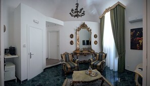 Quarto triplo | Área de estar | TV de tela plana