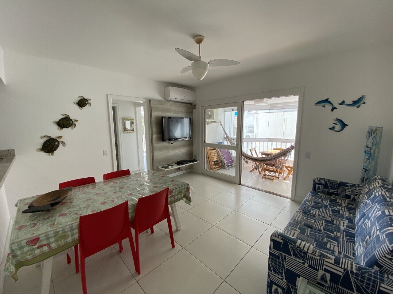 Apartamento Jurere Internacional | Área de estar | TV de tela plana 42 polegadas com canais a cabo, TV