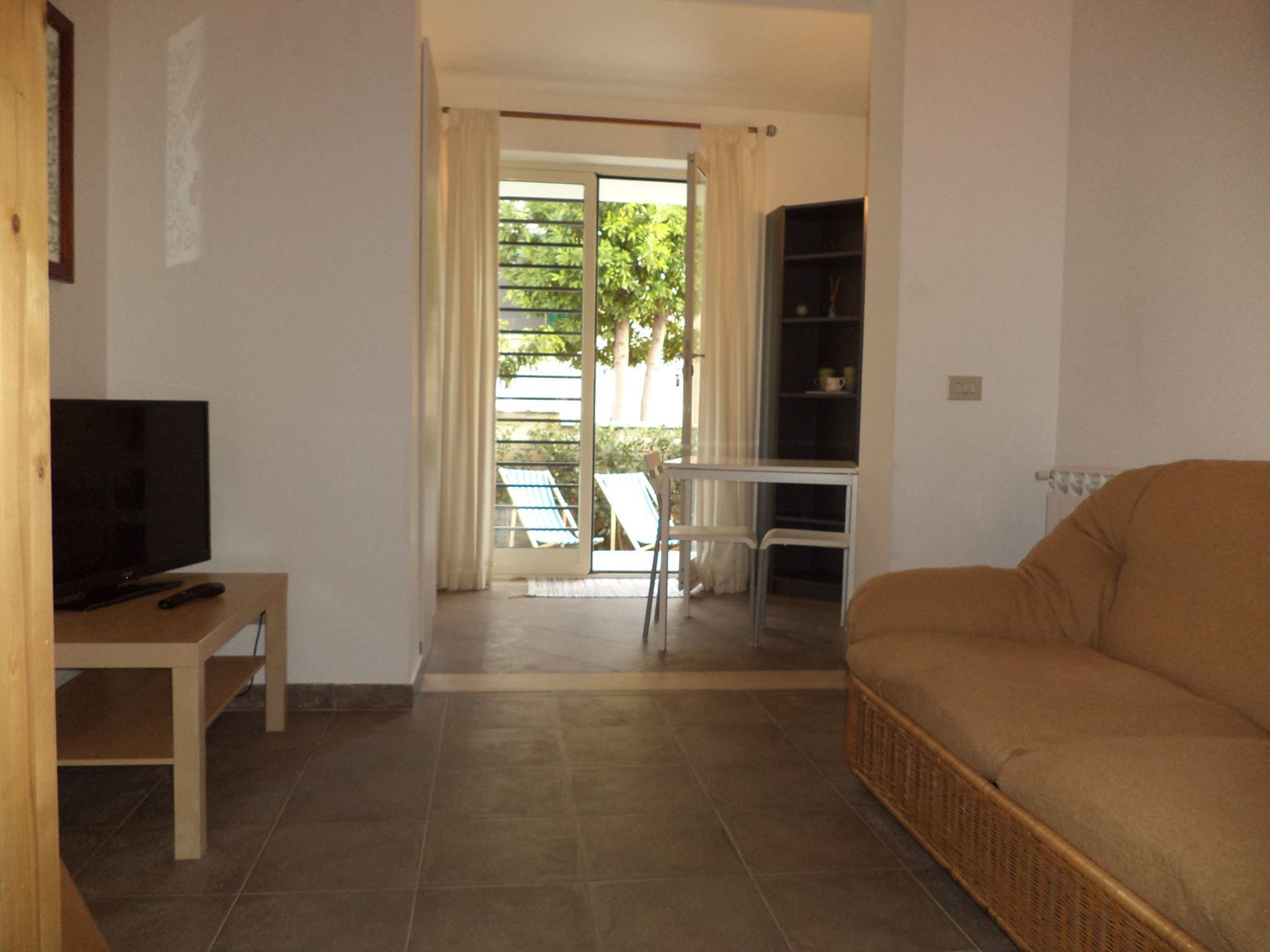 Duplex | Área de estar | TV de tela plana