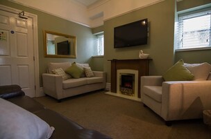 Suíte família | Área de estar | Smart TV