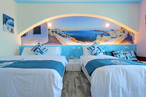 Quarto triplo standard, 1 quarto, vista para o mar | Escrivaninha, cortinas blackout, Wi-Fi de cortesia, roupa de cama