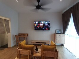 Quarto premium | Área de estar