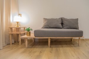 Suíte empresarial, 1 cama de casal | Área de estar