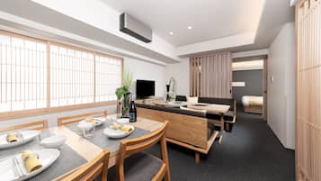 Apartamento, 1 quarto (4 Single-Beds) | Opções para refeição no quarto