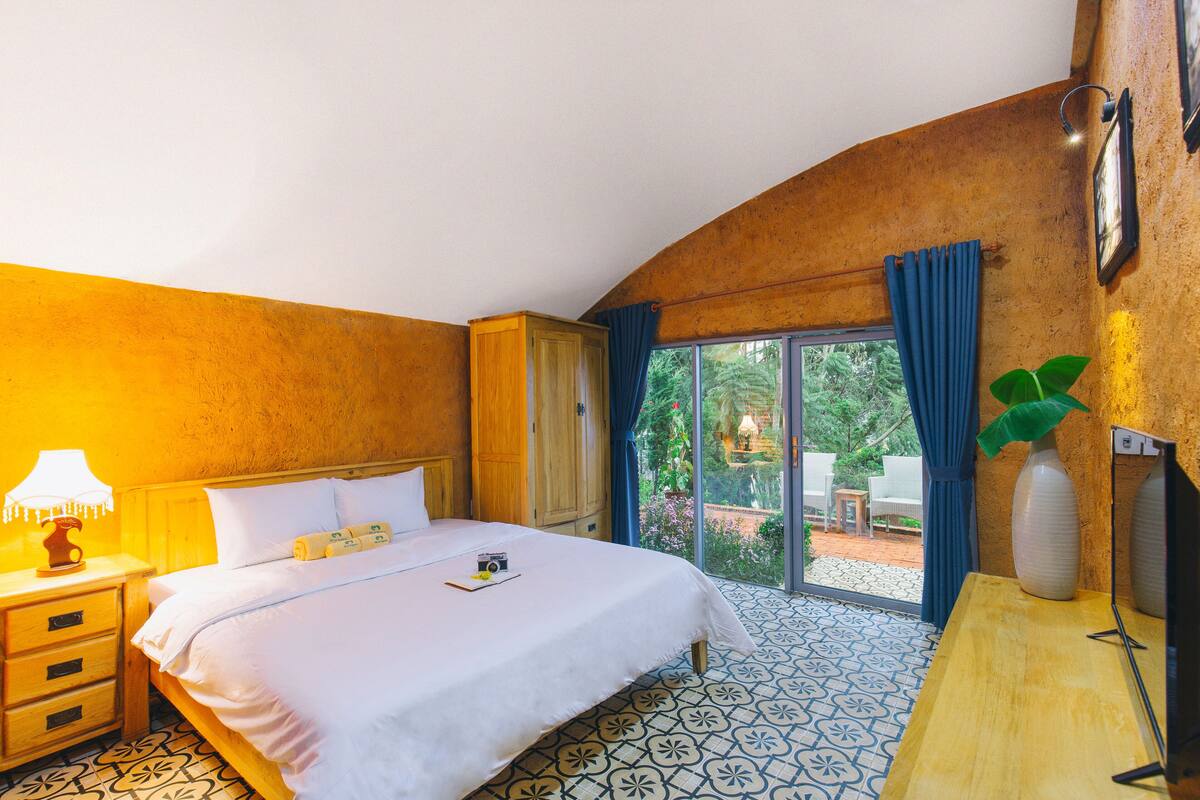 Bungalow Deluxe, vista para o jardim | 1 quarto, roupa de alta qualidade, minibar, secretária