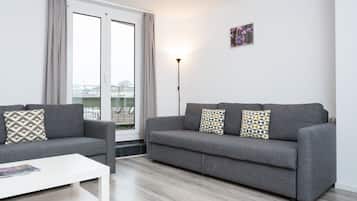 Apartamento Deluxe, Vista para a cidade | Com decoração personalizada, com mobília individualizada