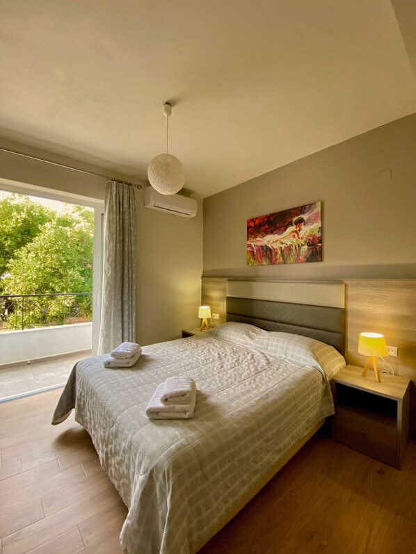 Apartamento de Luxo, 2 quartos | 2 quartos, lençóis de algodão egípcio, roupa de alta qualidade 