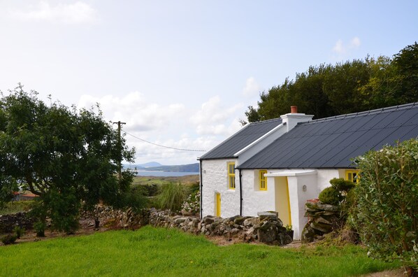 An Irish Idyll - traditional stonewall cottage nestled in hills above ...