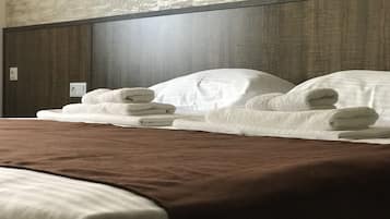 Quarto triplo executivo, 1 quarto | Frigobar, escrivaninha, cortinas blackout, quartos à prova de som