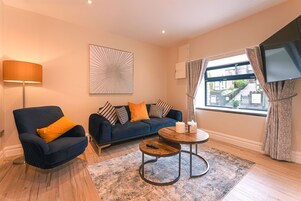 Apartamento luxo, suíte | Lounge