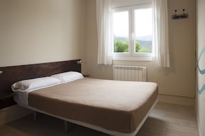 Cofres nos quartos, Wi-Fi de cortesia, roupa de cama