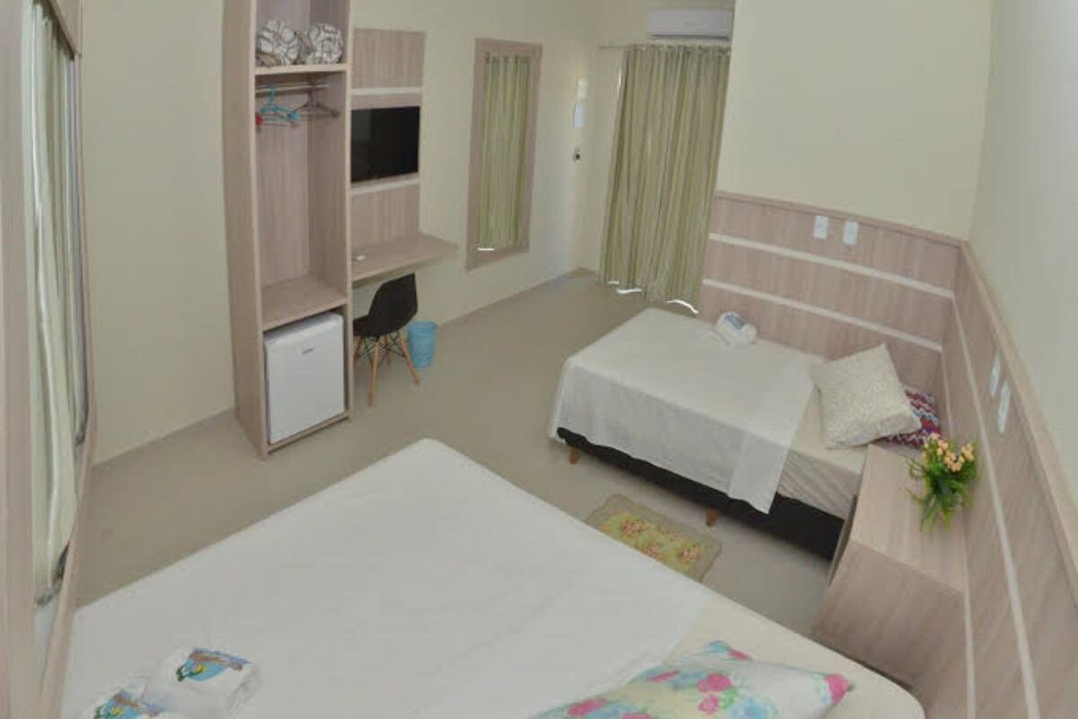 Quarto premium, Varanda, Vista para o jardim (ate 4 pessoas) | Frigobar, individualmente decorados, individualmente mobiliados